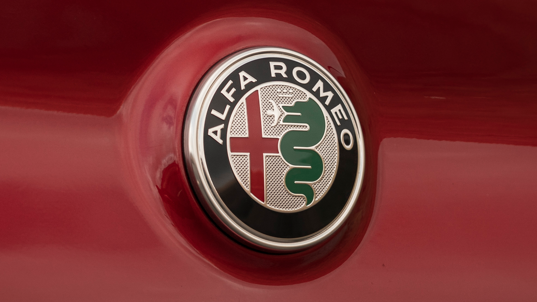 Why Does The Alfa Romeo Badge Have A Serpent On It? | CarThrottle